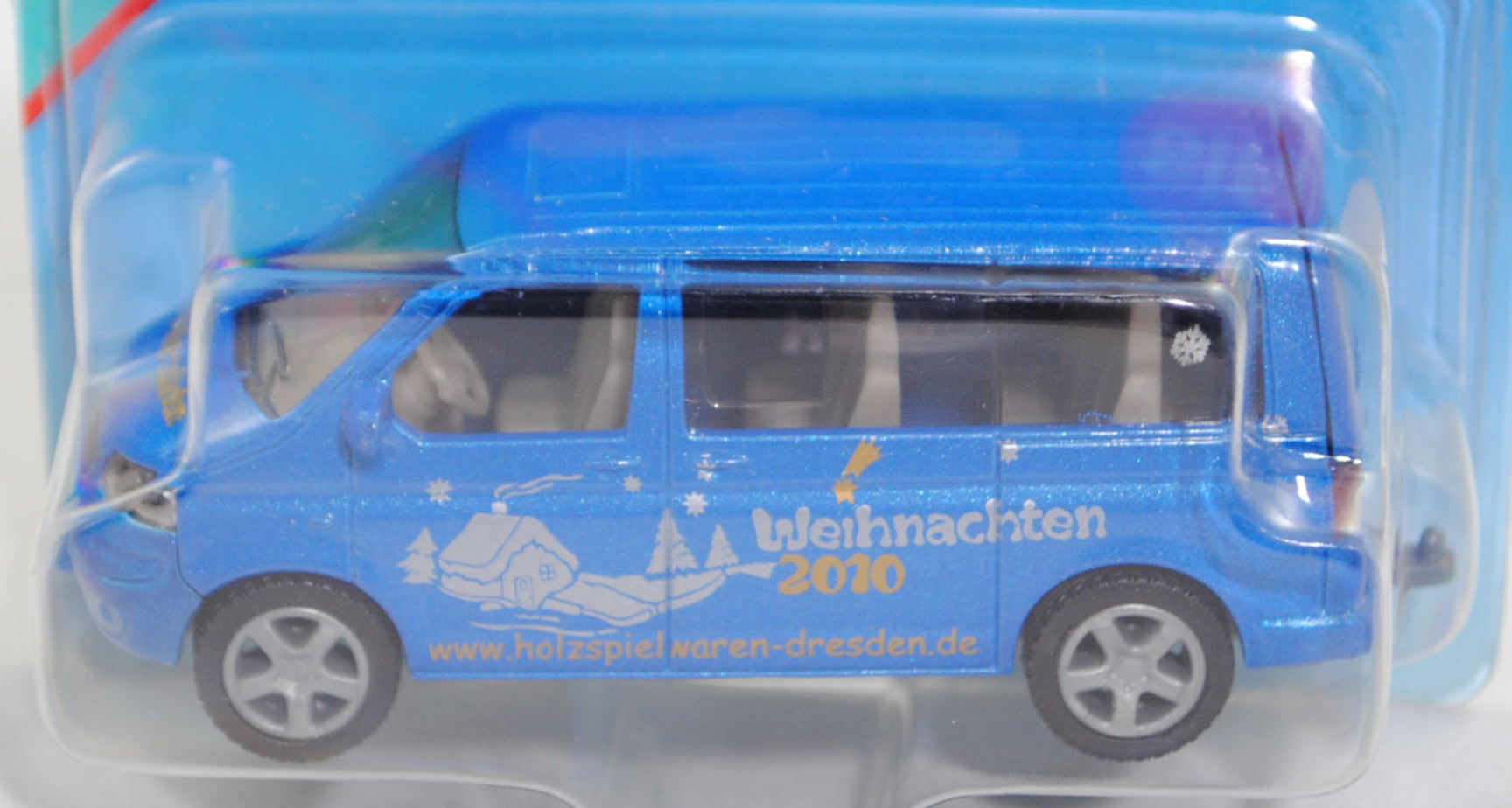 00004 VW T5.1 Multivan (Modell 2003-2009), hell-verkehrsblaumetallic, Holzspielwarenladen, P29b ...